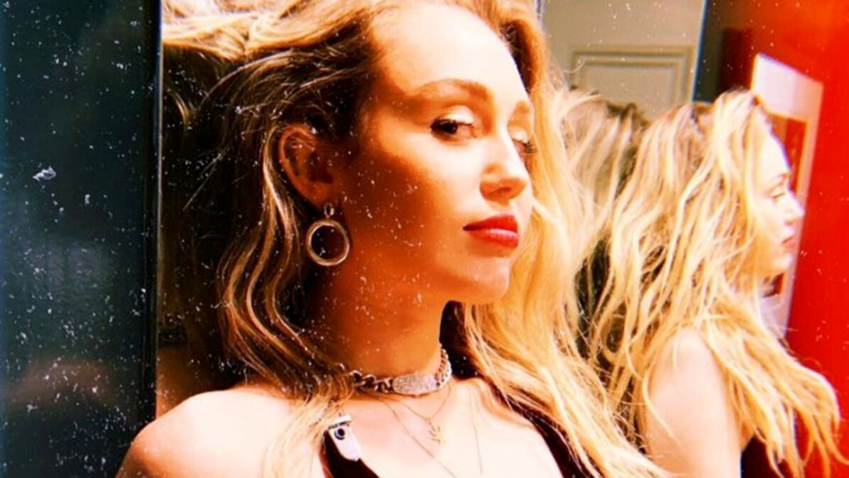Miley Cyrus’ Plunging Neckline Reveals A Lot On Instagram