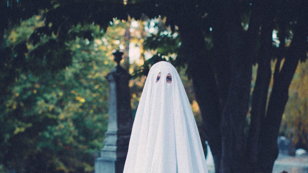Police caught a man who was pretending to be a ghost in a local cemetery