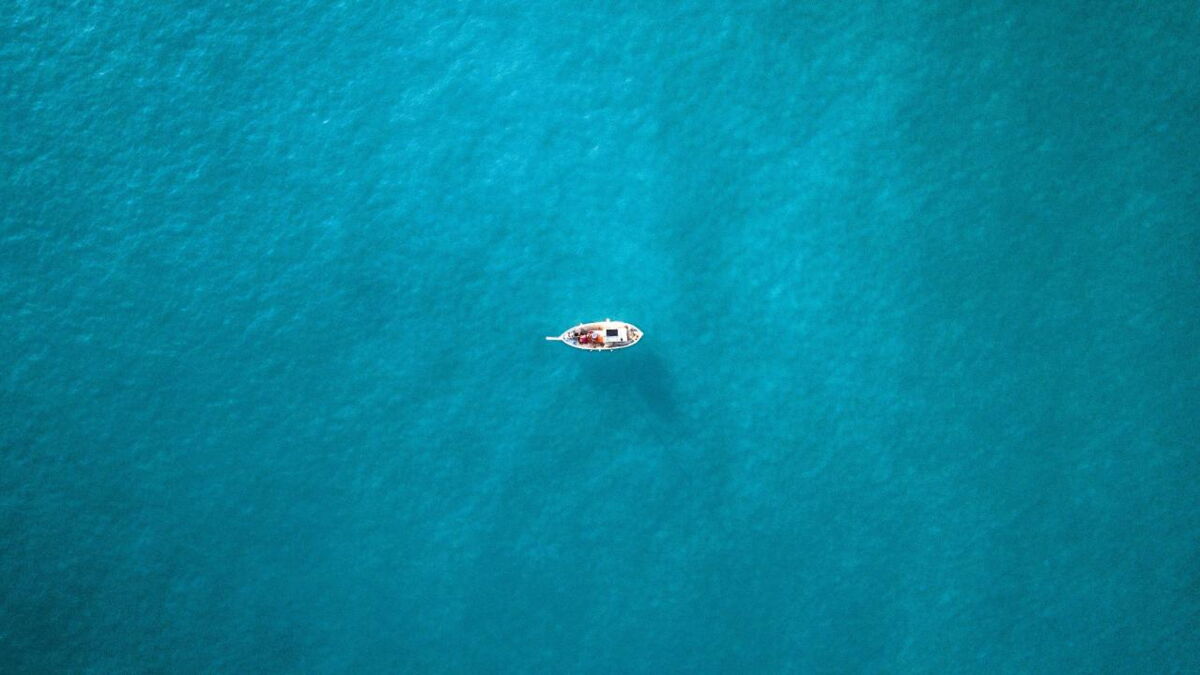 Man stranded in ocean survives after being found floating in a freezer ...