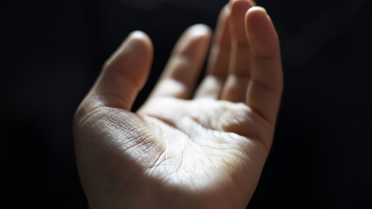 If you look between the palm lines for the letter 'M,' you might be ...