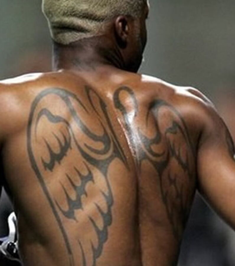 Photos : Tatouage Djibril Cissé: tous les tatouages du footballeur français