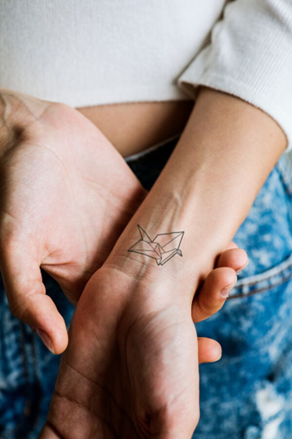 Tatouage poignet : 20 idées tatouage pour une femme